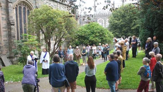 People gather at Tavistock parish church as mark of respect for victims ...
